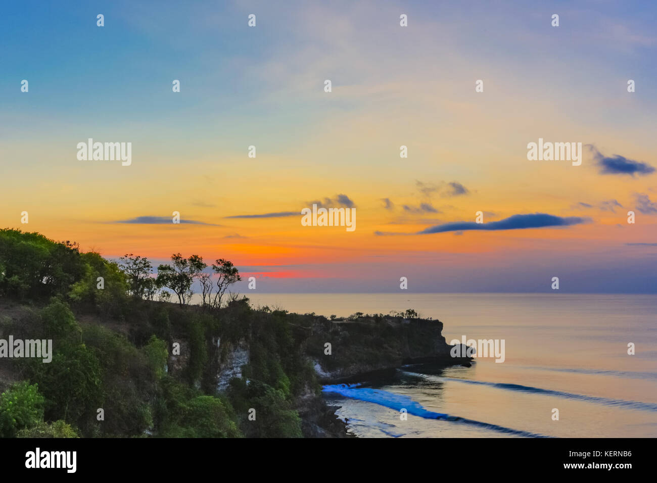 Balangan beach at sunset. Jimbaran, Bali, Indonesia Stock Photo - Alamy
