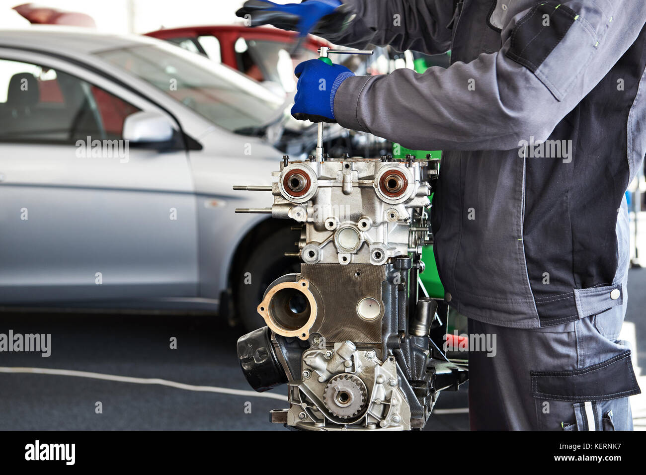 Repair of a car engine in a car workshop Stock Photo - Alamy