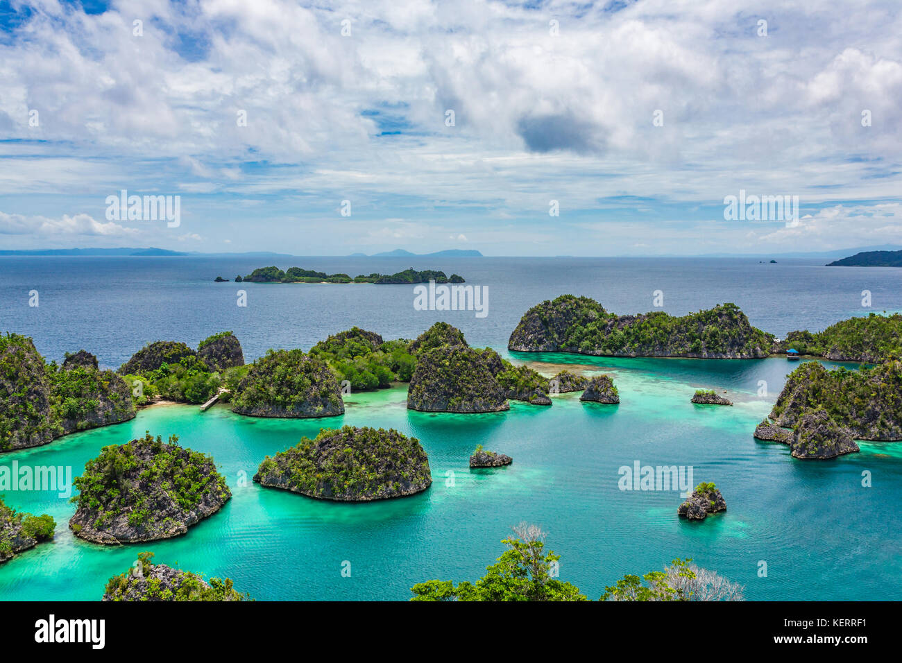 Pianemo Islands, Blue Lagoon with Green Rocks, Raja Ampat, West Papua ...
