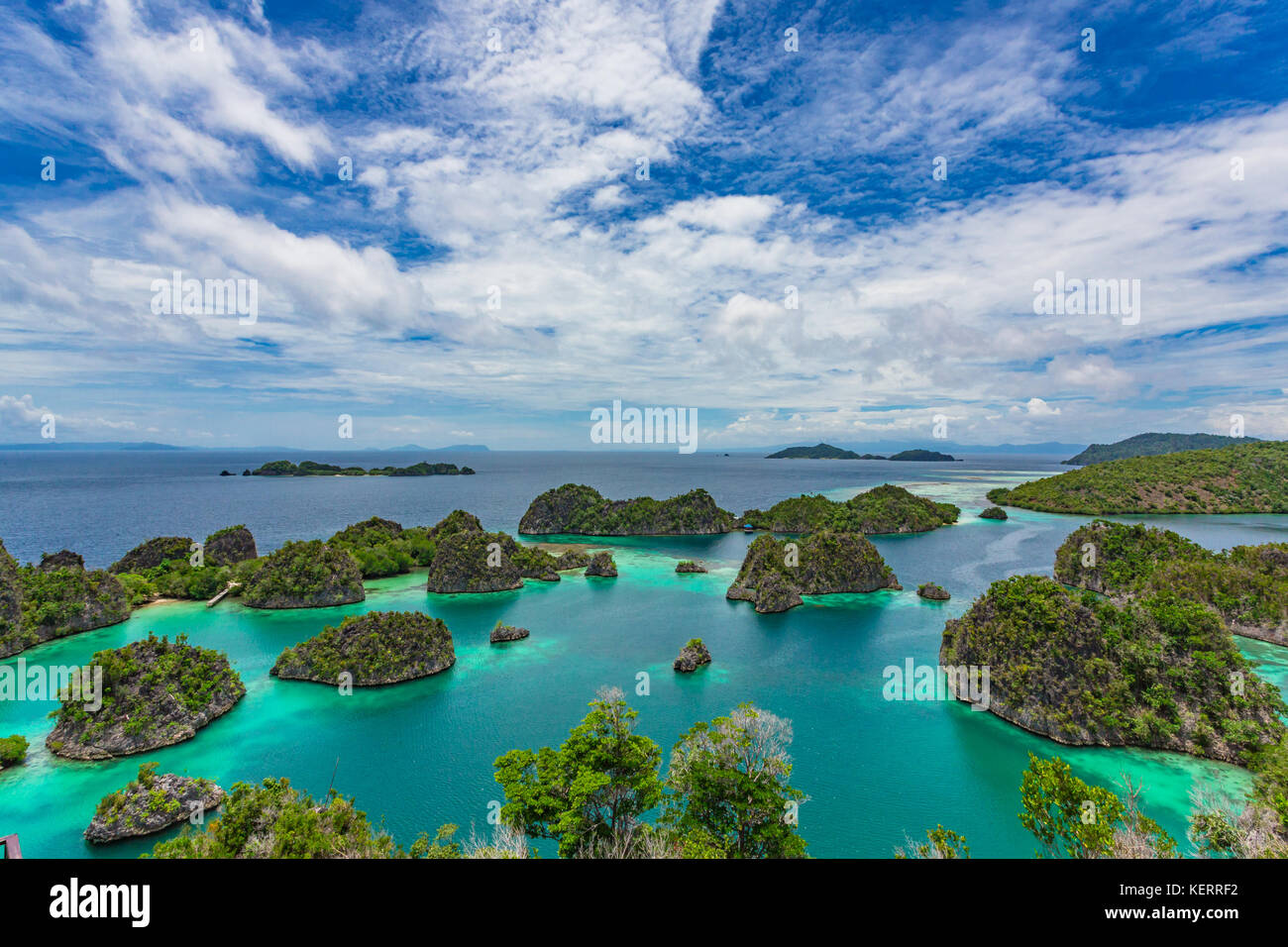 Pianemo Islands, Blue Lagoon with Green Rocks, Raja Ampat, West Papua ...