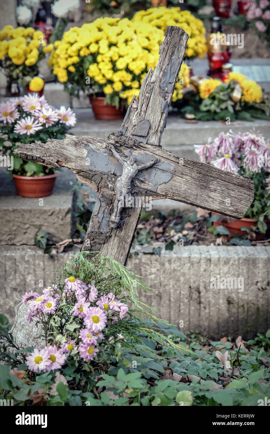 Old forgotten grave with ratty and weathered wooden cross Stock Photo ...