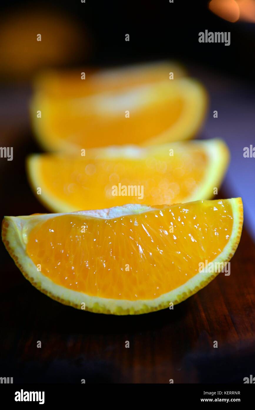 Orange Fruit Quarters close up Stock Photo - Alamy