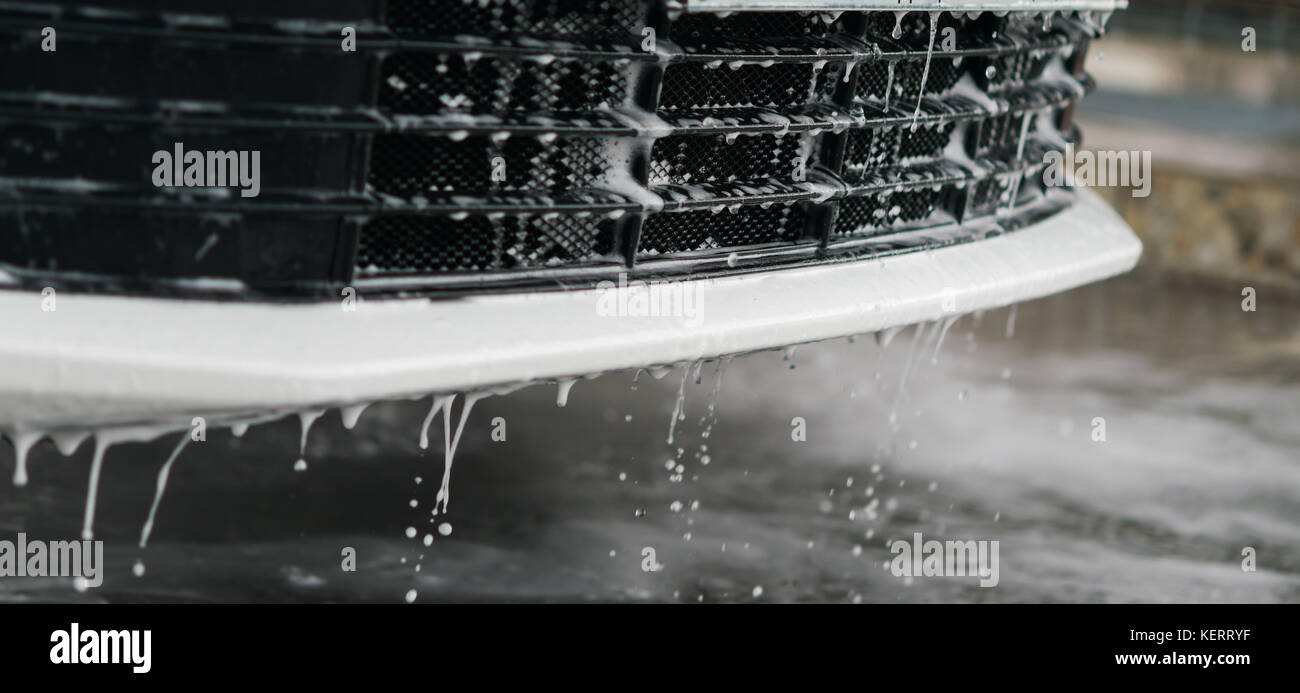 drops of water and foam flow beautifully from the front bumper grille ...