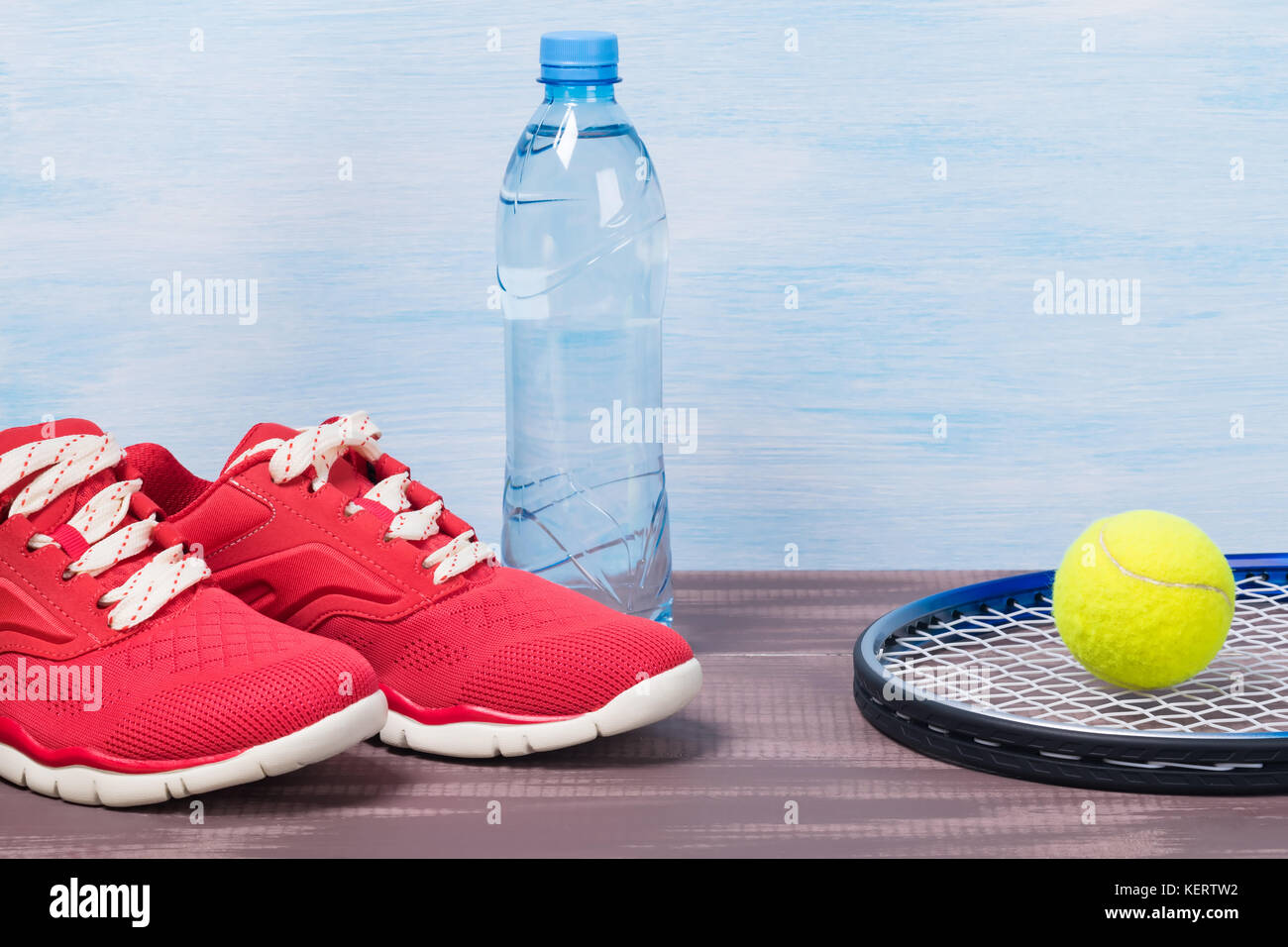 Set for playing tennis with red sneakers Stock Photo - Alamy