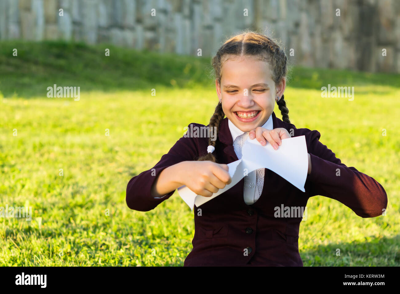 Girl rips paper hi-res stock photography and images - Alamy