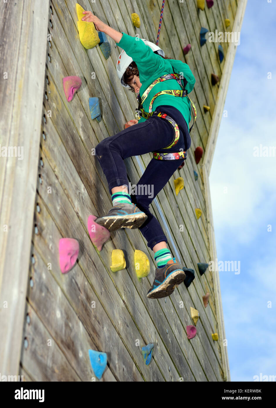 Youngster using climbing wall to help raise money for a new scout ...