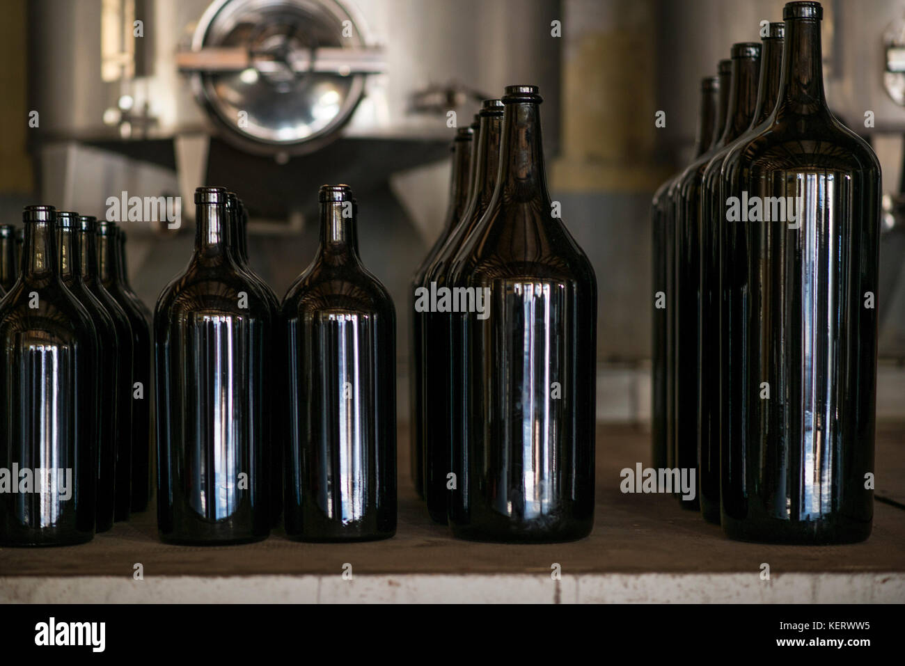 Wine Bottles of Various Sizes in Winery Stock Photo - Alamy