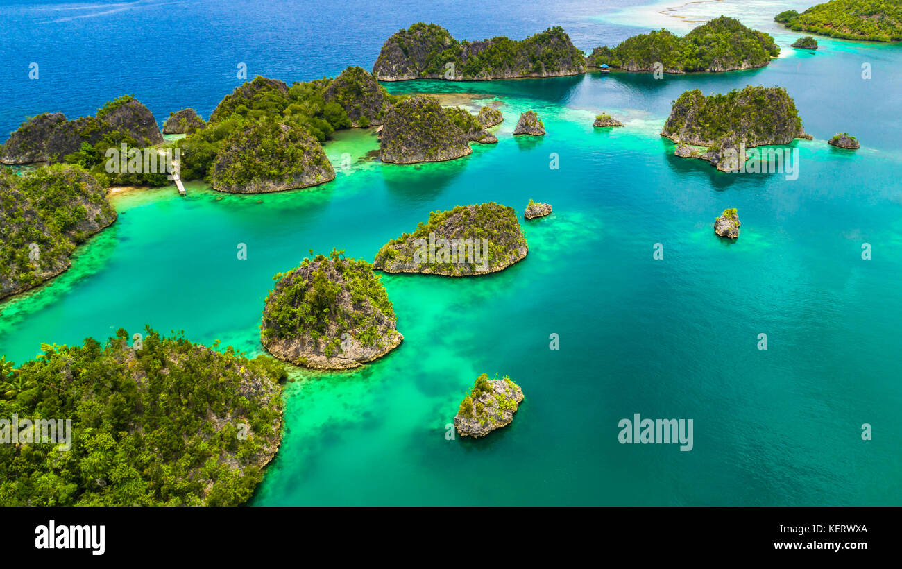 Pianemo Islands, Blue Lagoon with Green Rocks, Raja Ampat, West Papua ...