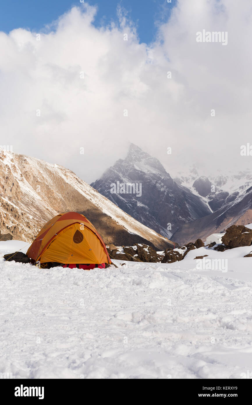 Tenting during winter in mountains Stock Photo - Alamy