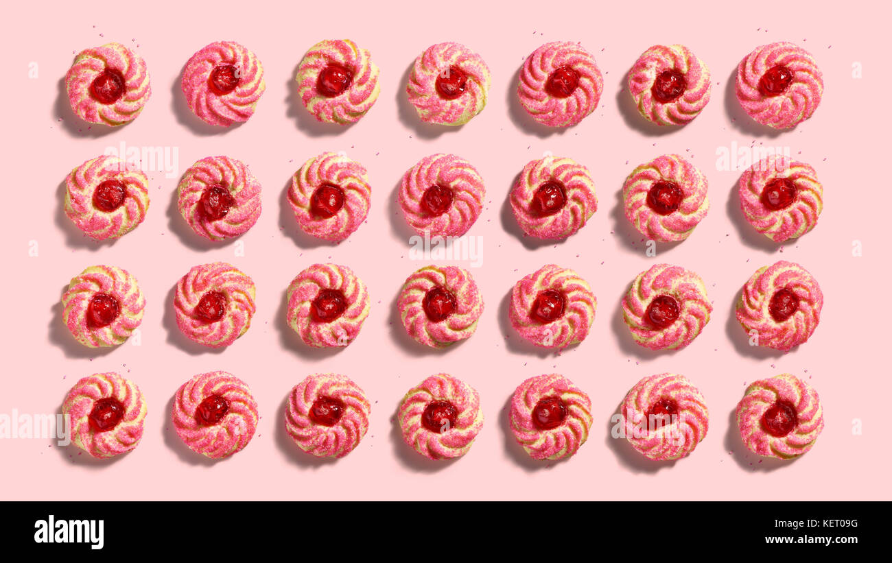 Overhead view of a colorful pattern of amaretti, cherry almond, cookies ...