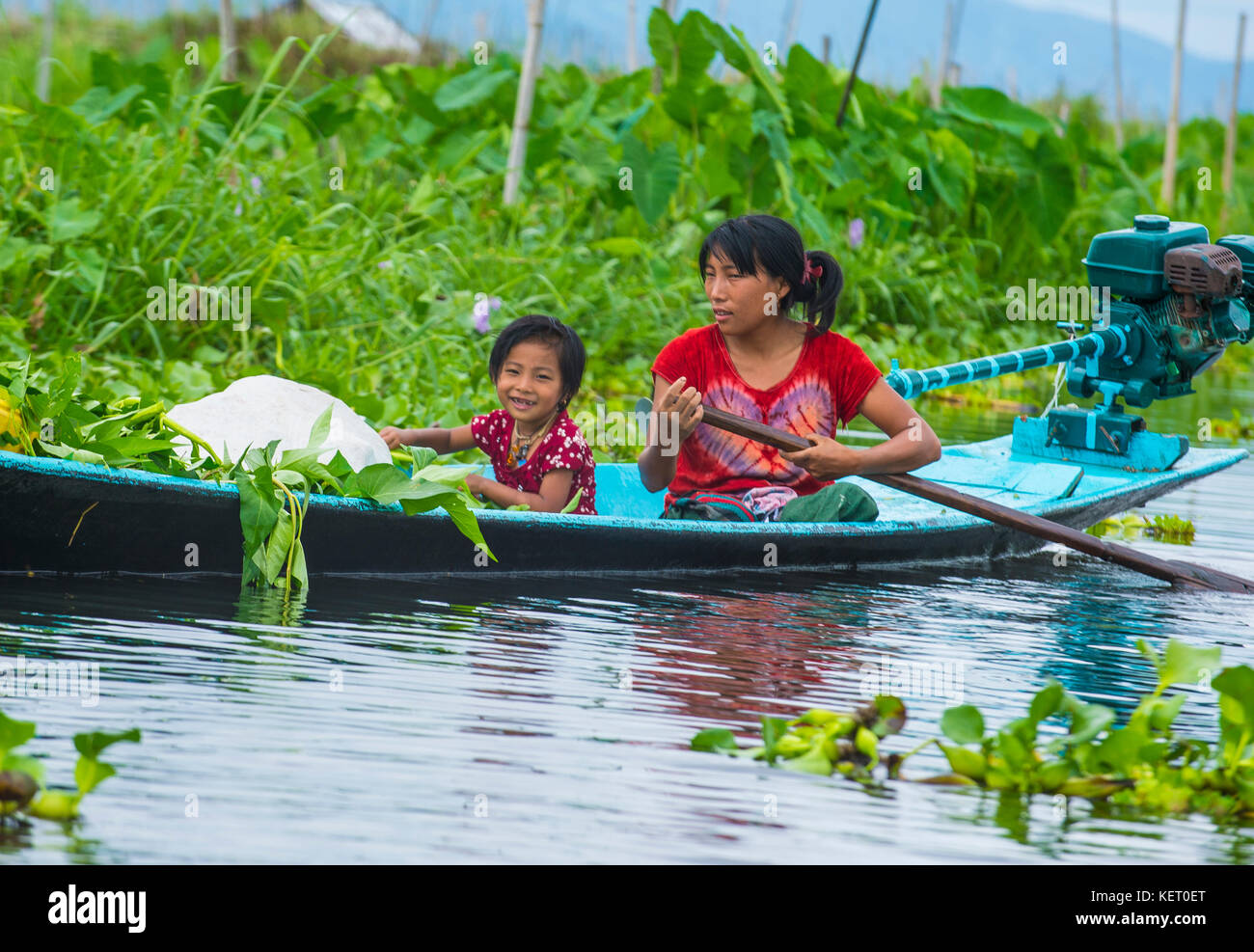 Intha people working on there floating garden in Inle lake Myanmar ...