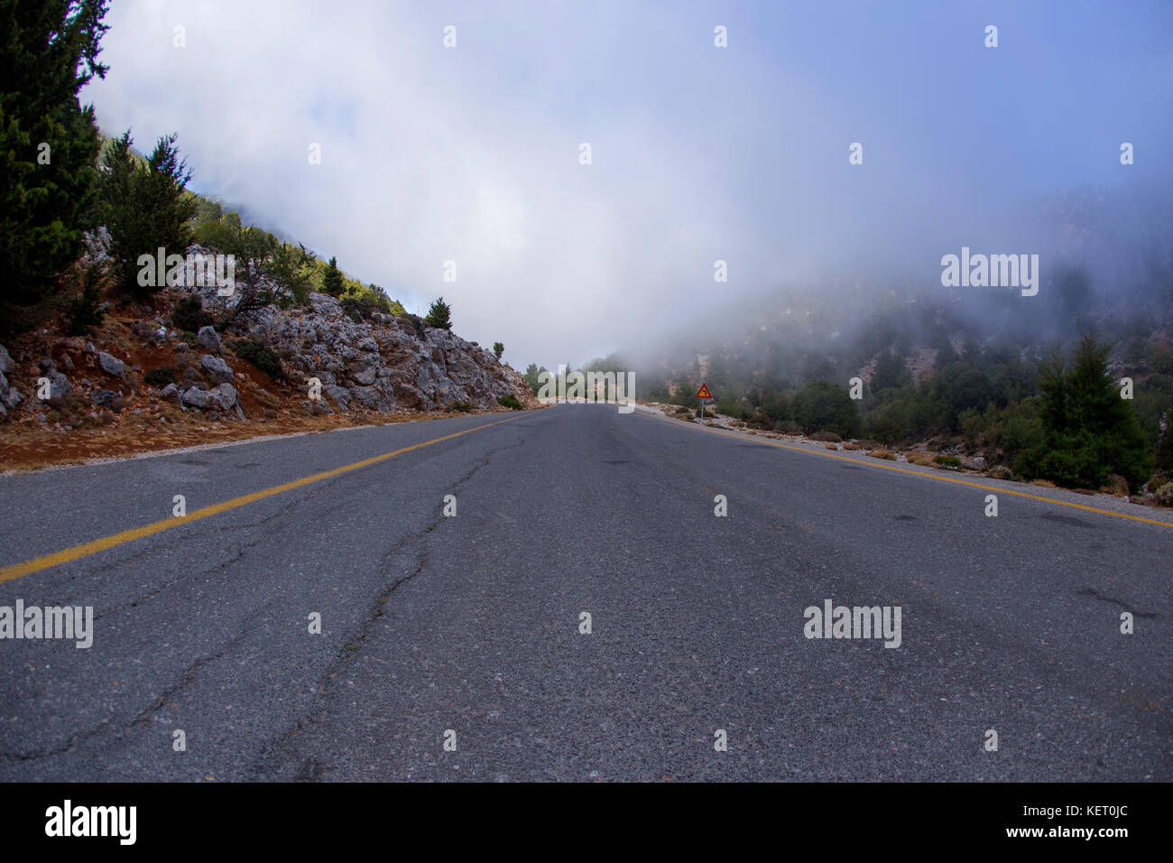 Clouds over road Stock Photo - Alamy