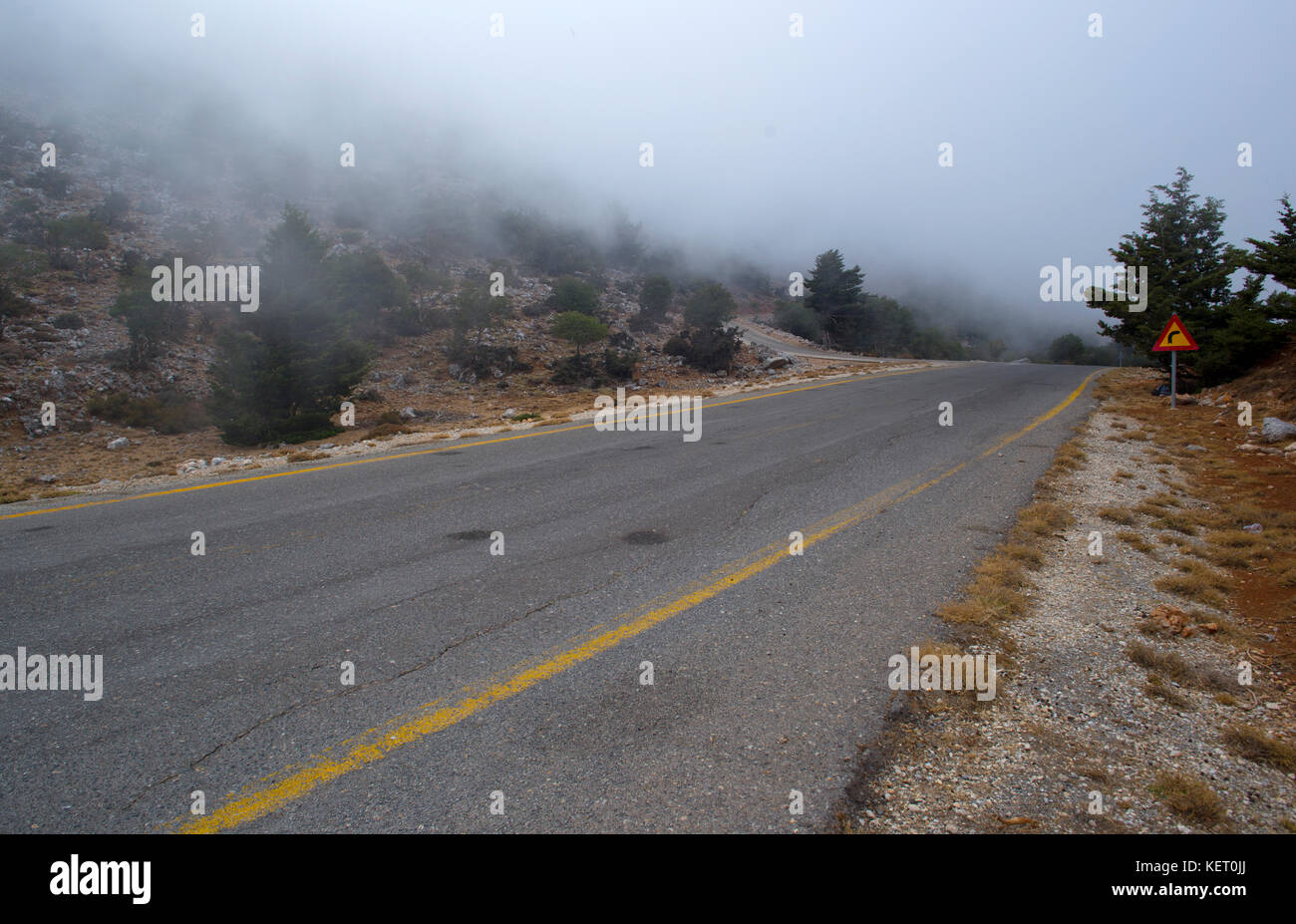 Clouds over road Stock Photo - Alamy