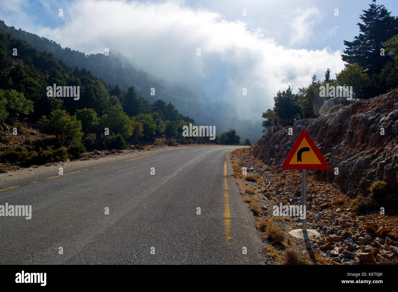 Traffic sign on a mountain road Stock Photo - Alamy