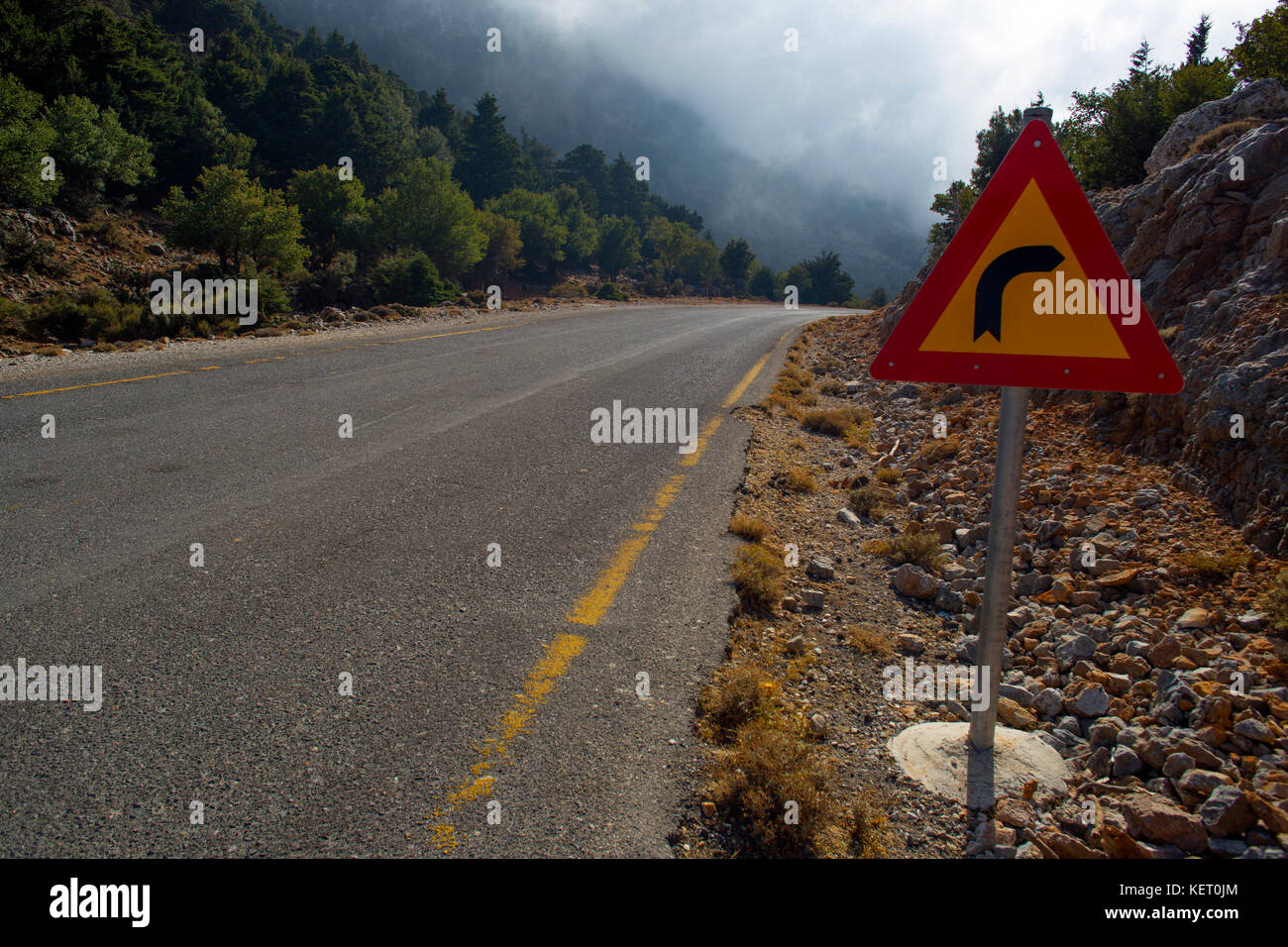 Traffic sign on a mountain road Stock Photo - Alamy
