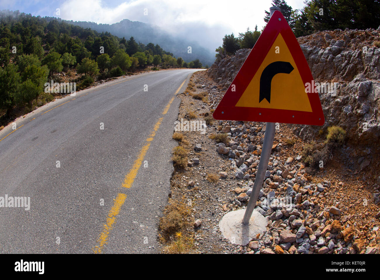 Traffic sign on a mountain road Stock Photo - Alamy