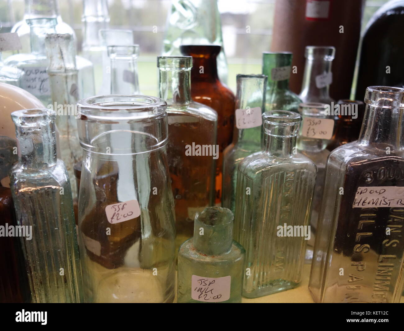 A collection of vintage glass medicine bottles Stock Photo - Alamy