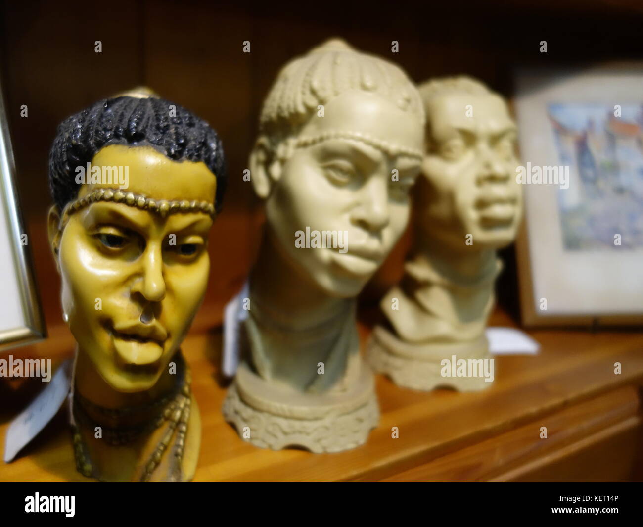 a collection of ceramic aboriginal heads Stock Photo - Alamy