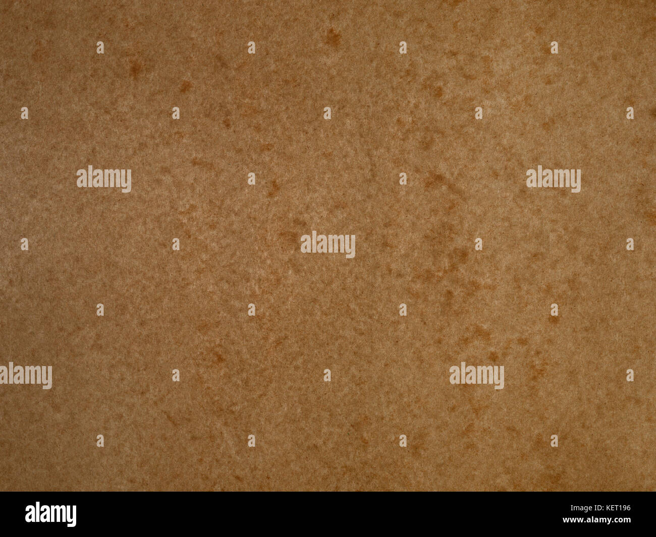 Smooth tan brown mottled cardboard background Stock Photo - Alamy