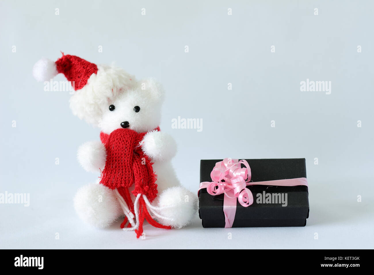 gifts with shiny bows on a Christmas party decor Stock Photo - Alamy