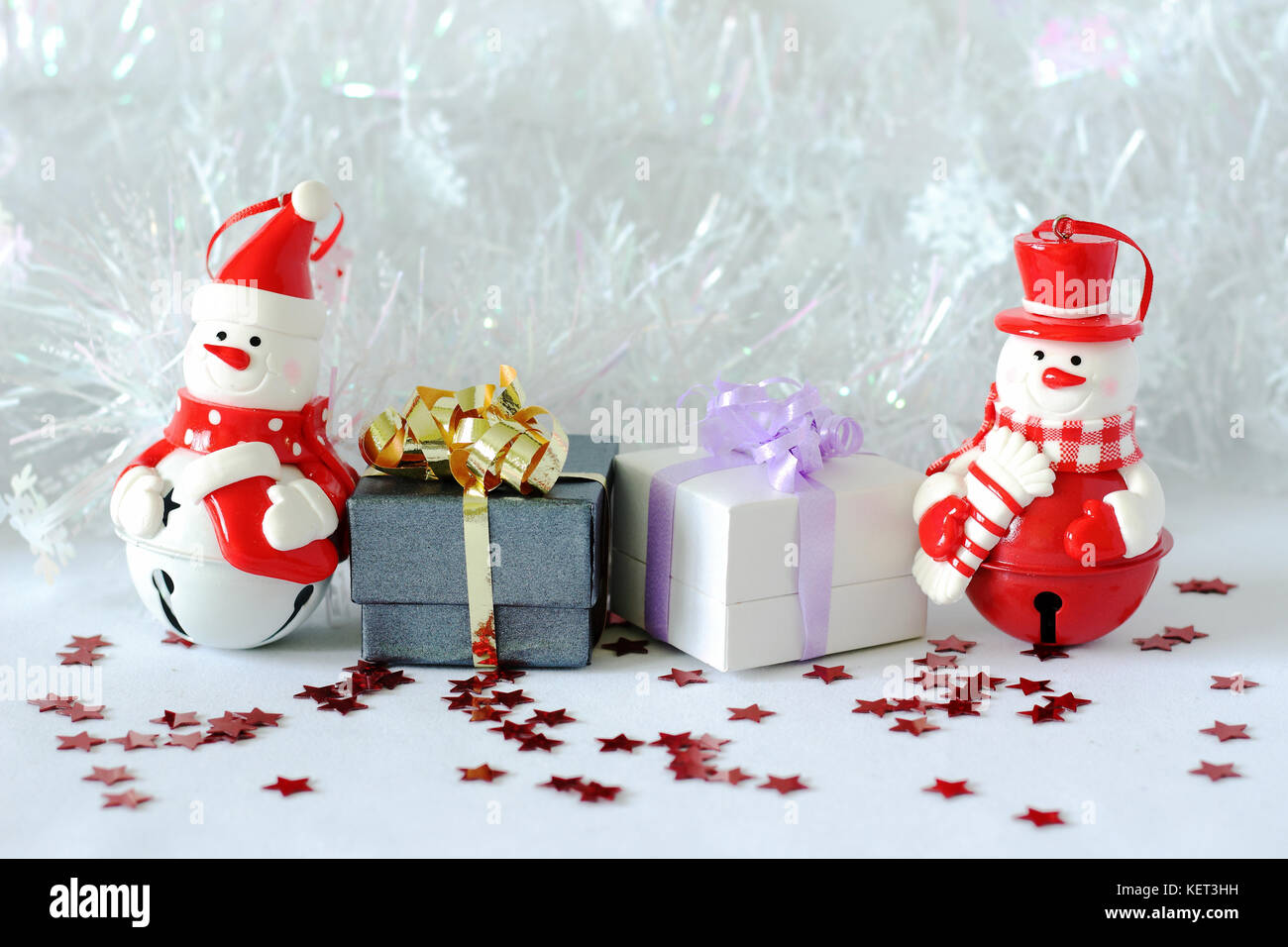 gifts with shiny bows on a Christmas party decor Stock Photo - Alamy