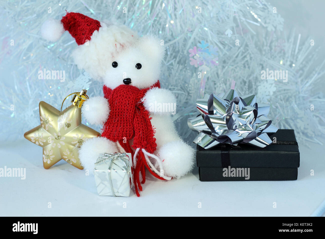 gifts with shiny bows on a Christmas party decor Stock Photo - Alamy