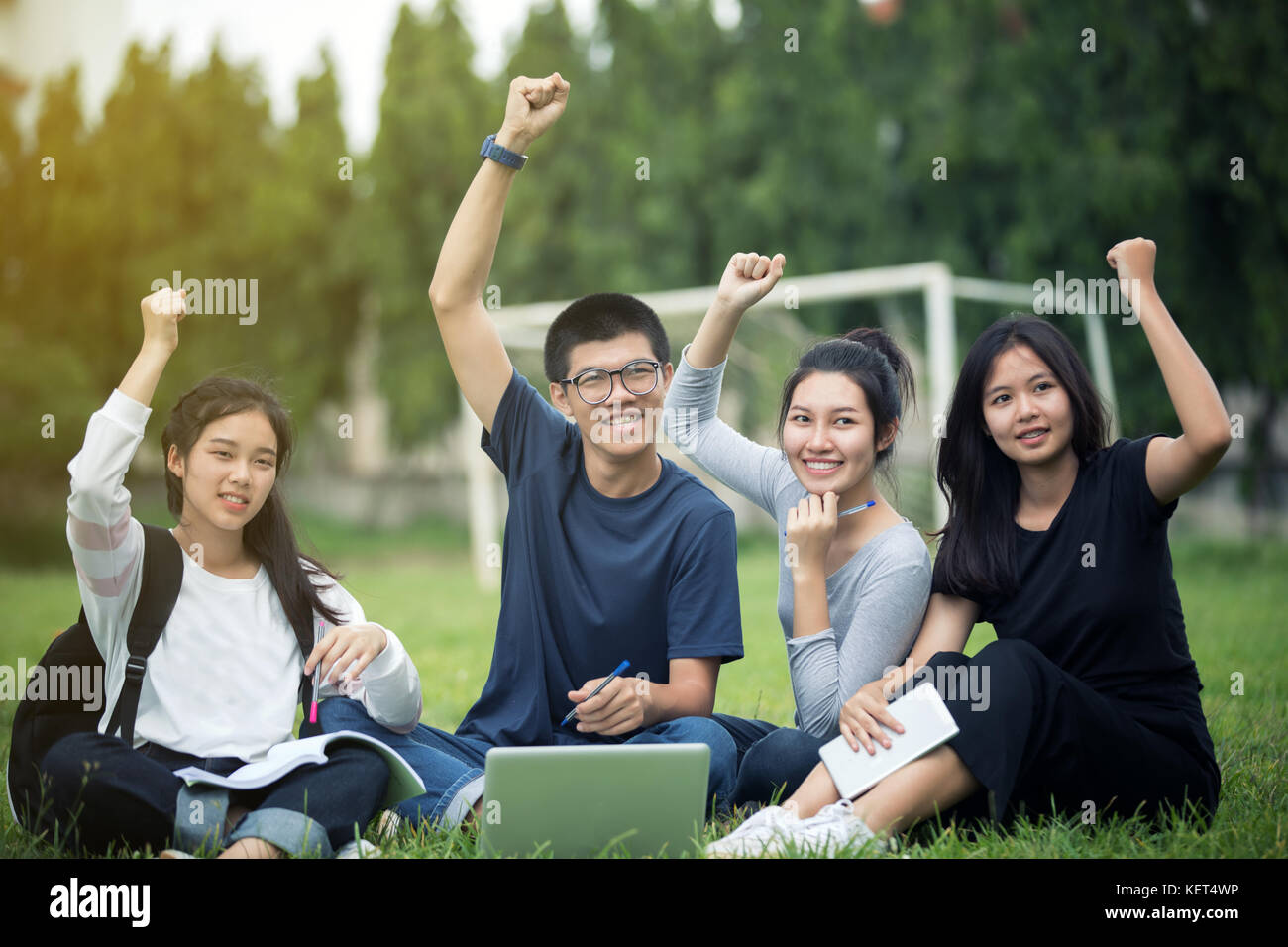 Asian Group of students Success and winning concept - happy team with ...