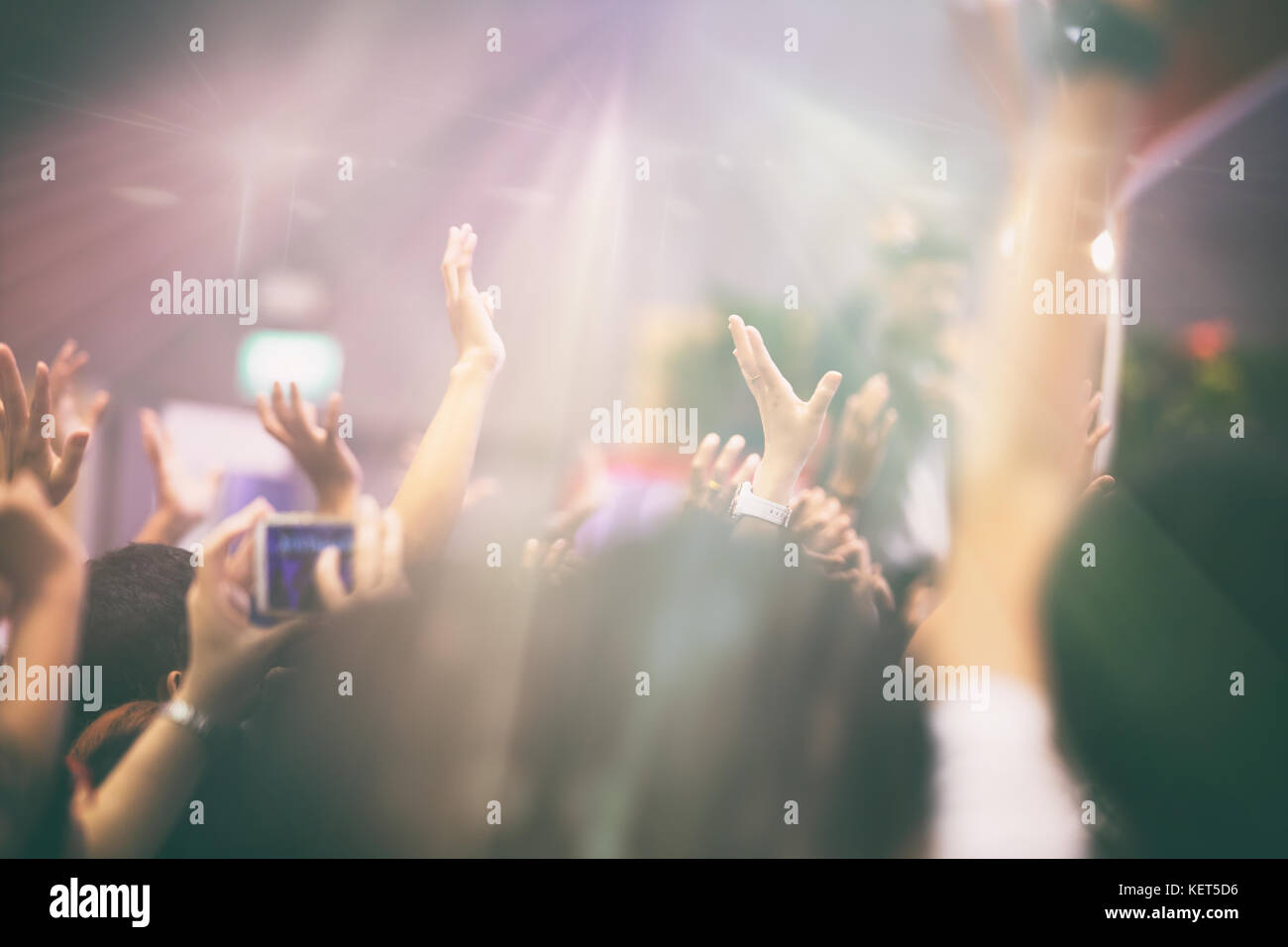 Crowd at concert stage lights,blurry background Stock Photo - Alamy
