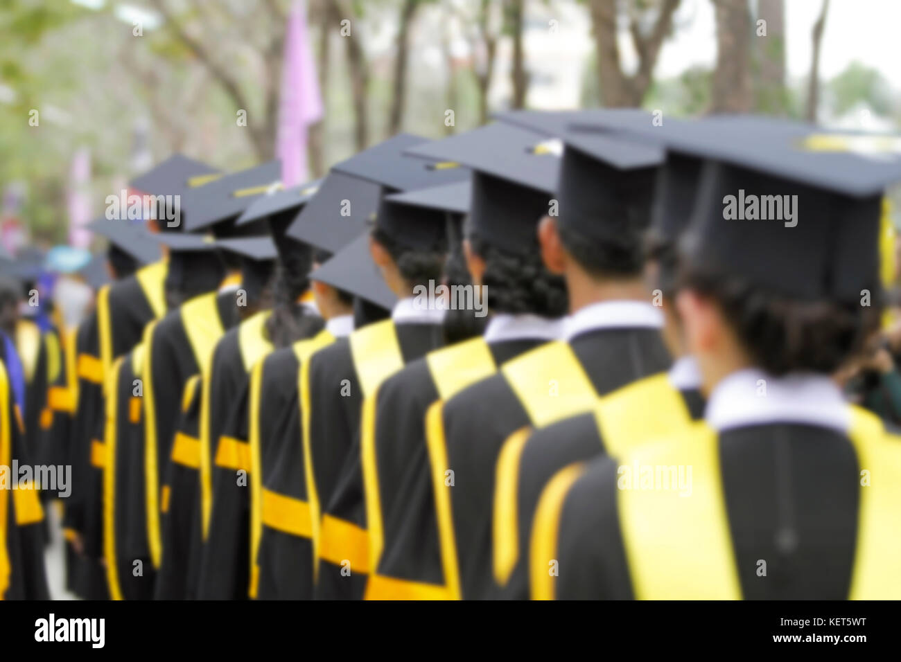 Graduates are walking the line to get a diploma and selective focus ...