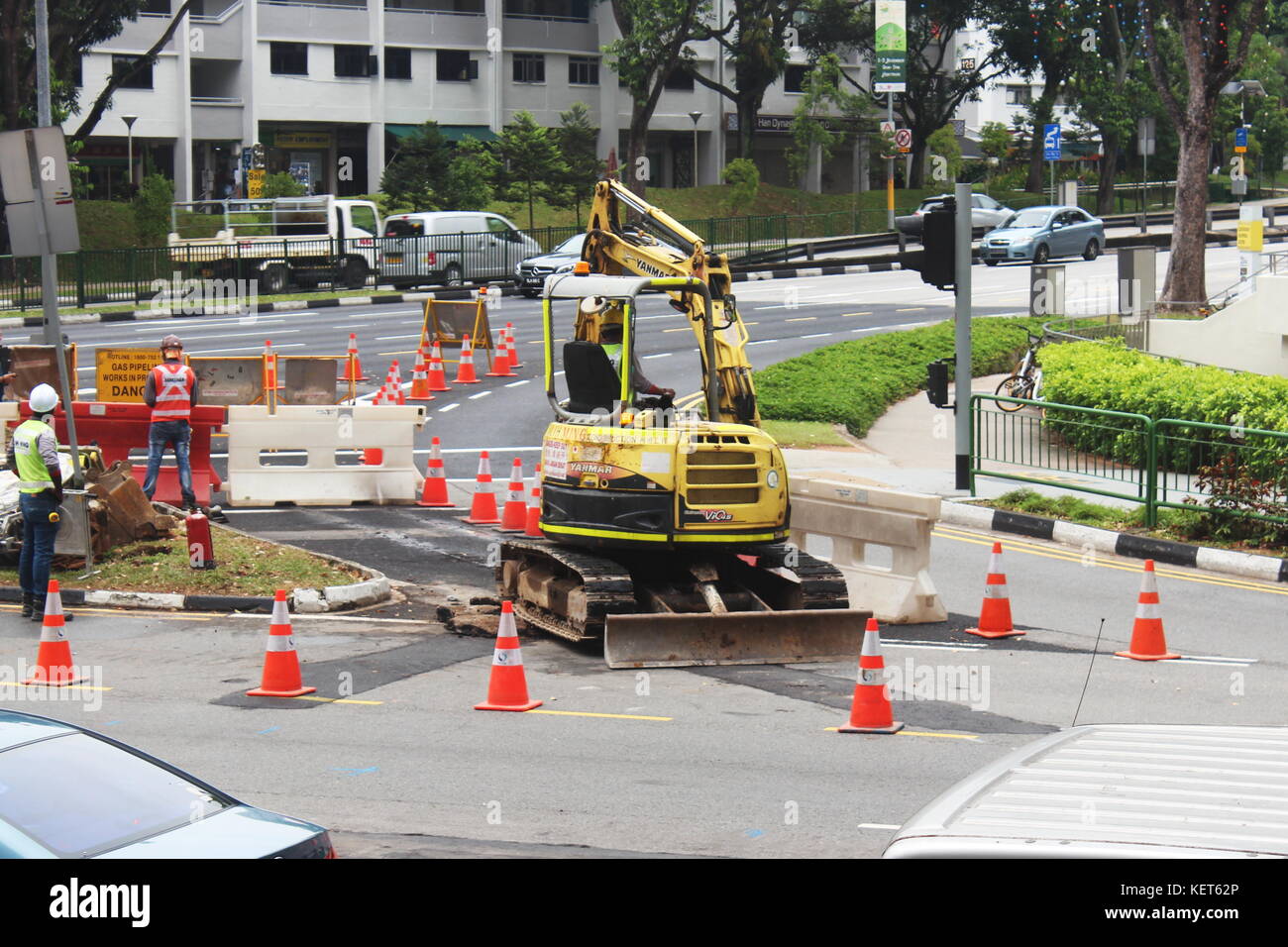 Digger at a Construction SIte Stock Photo - Alamy