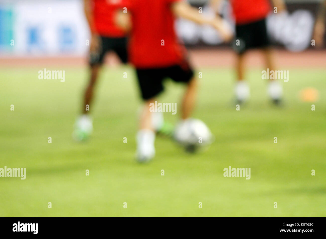 blurry soccer and football player training for background Stock Photo ...