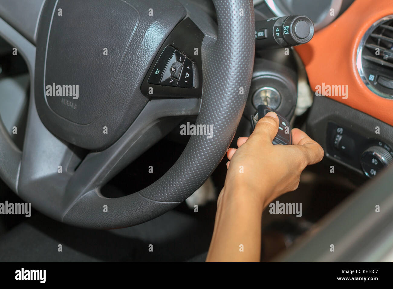 Woman 's hands hold the key for starting the car,selective focus on ...