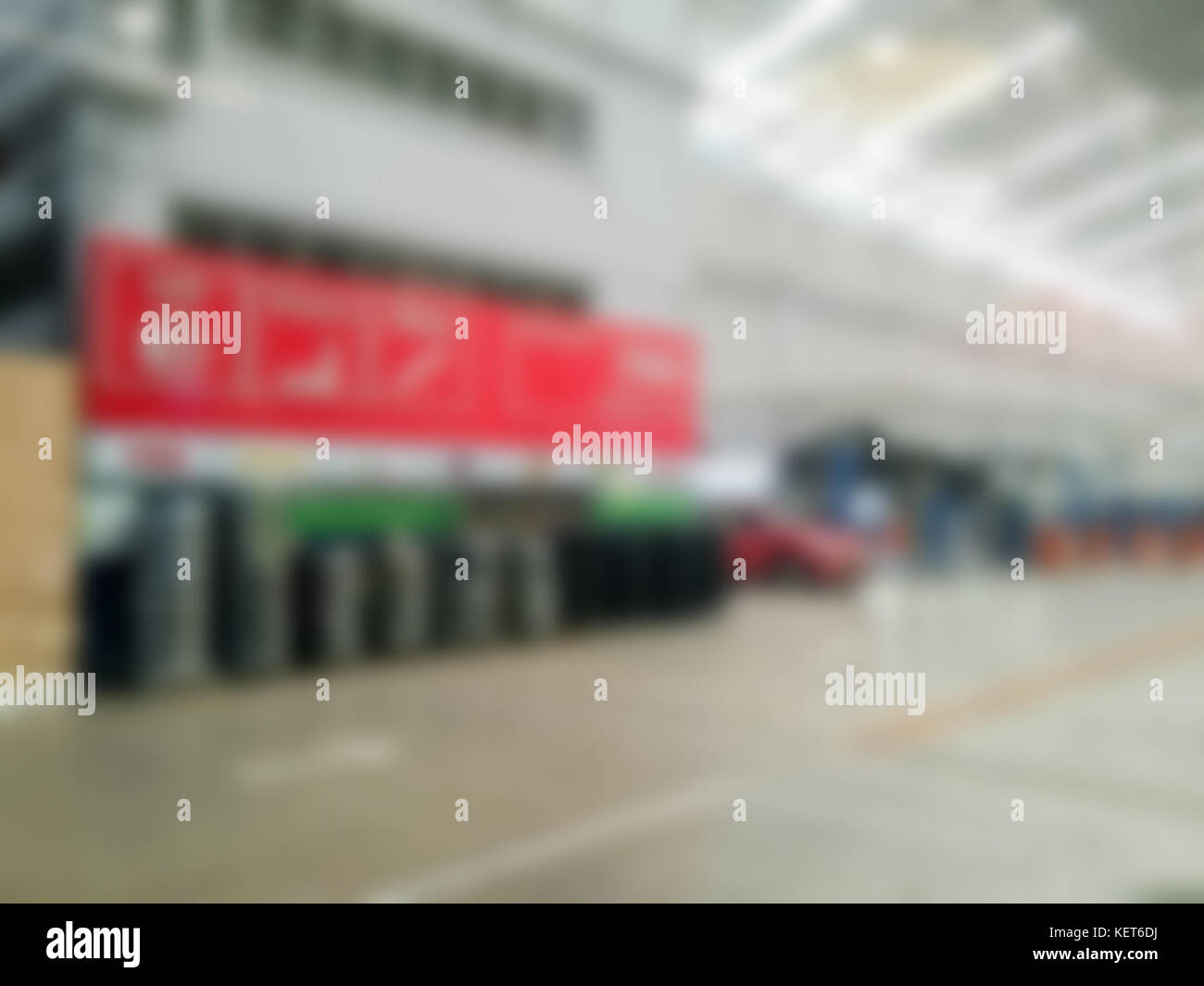 blurry cars on lifts in small service station for background Stock ...