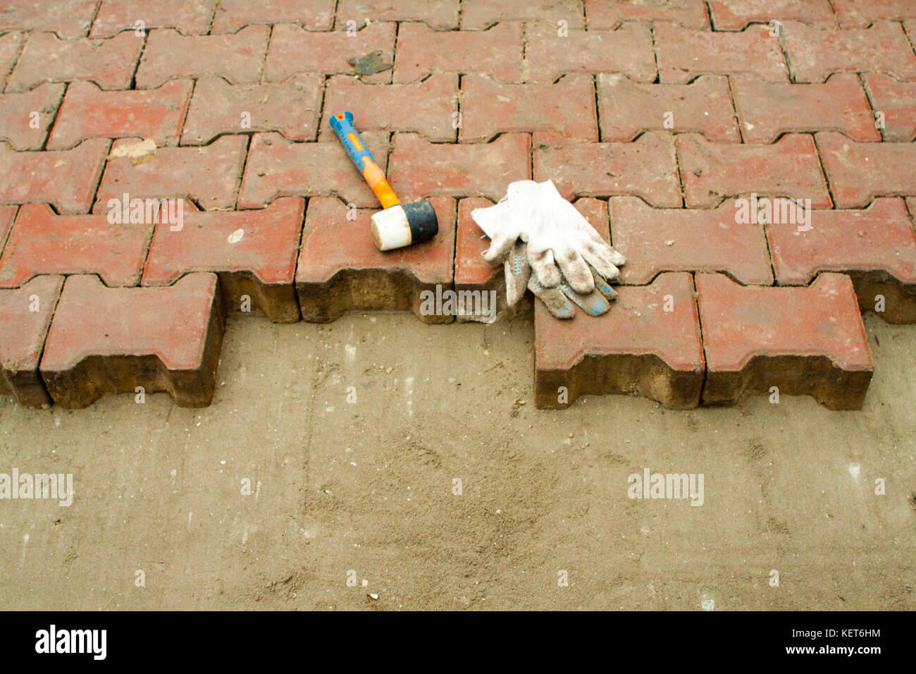 Laying Paving Slabs by mosaic close-up. Road Paving, construction ...