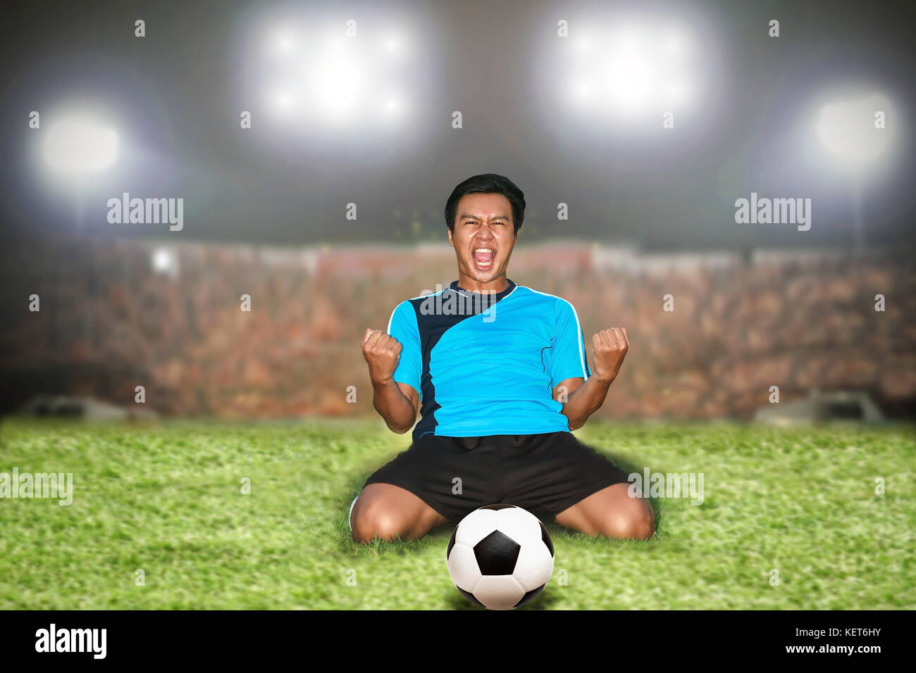 soccer football player young man happiness joy kneeling and soccer ...
