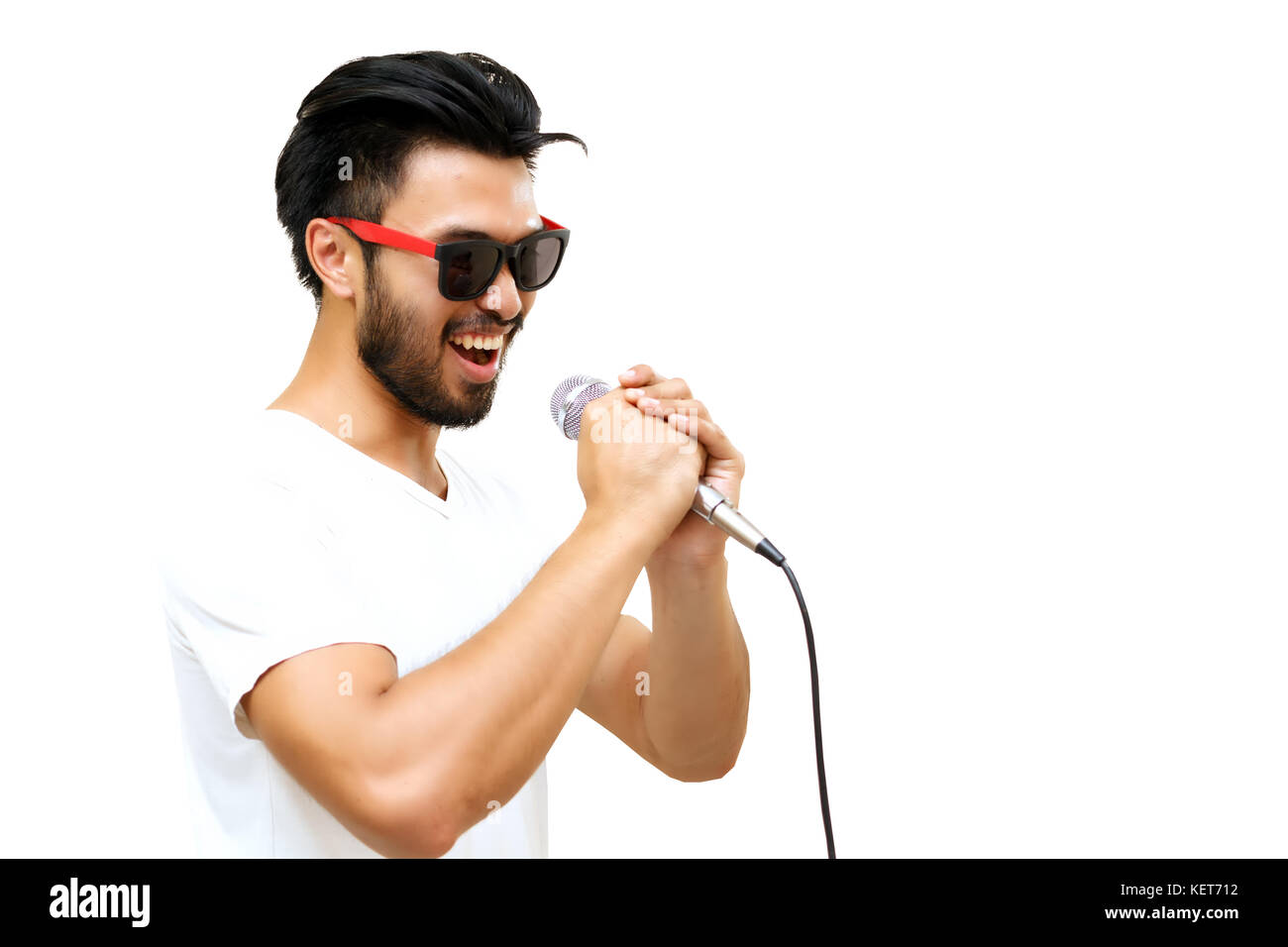 Young asian person pop singer mic hi-res stock photography and images ...