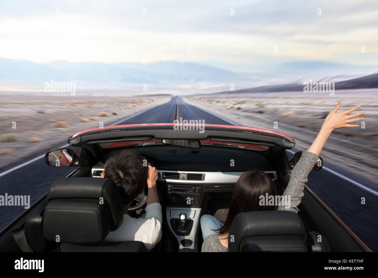 Young men and women driving out to travel Stock Photo - Alamy