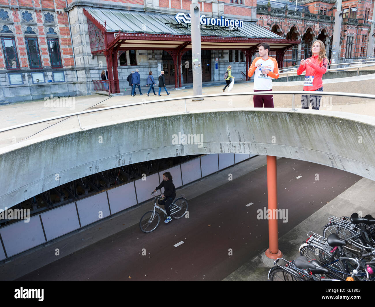 bike on bicycle track under square in front of railway station ...