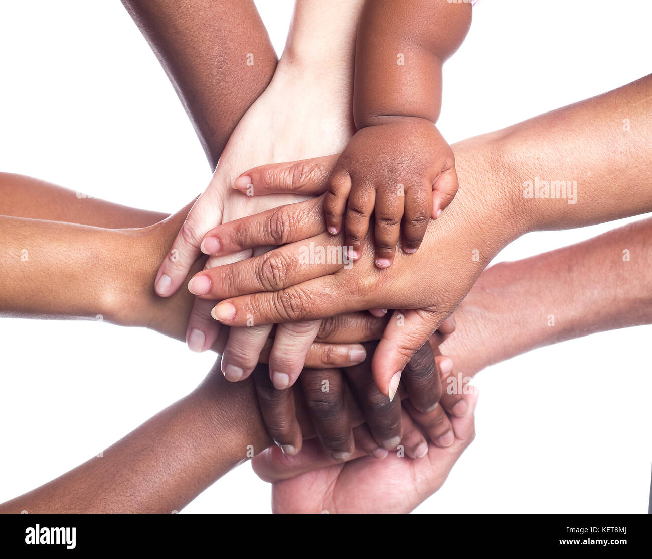 A close up view of a large group of people of mixed races, genders and ages holding hands in a ...