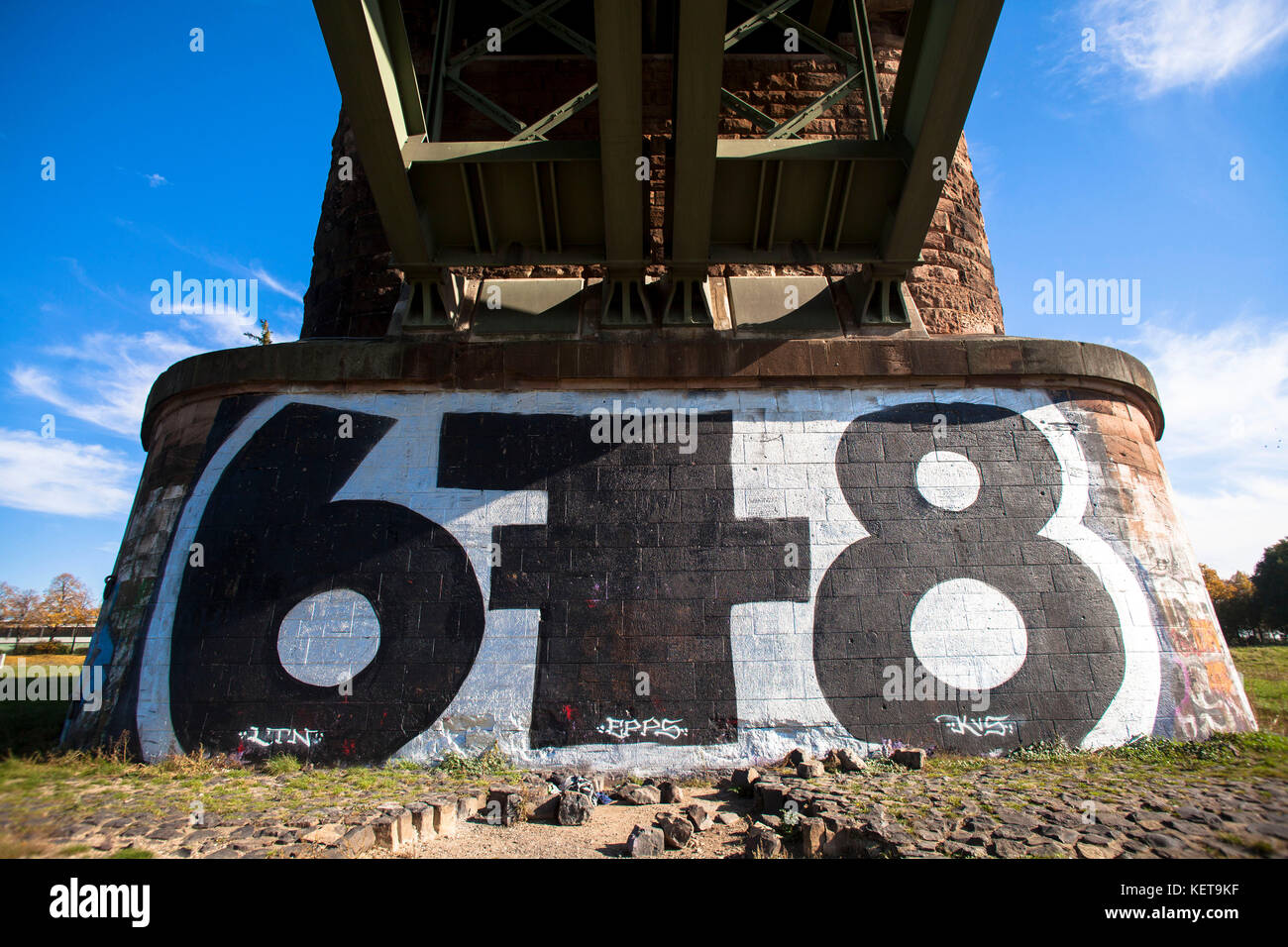 Germany, Cologne, graffiti on a pillar of the Suedbruecke in the ...