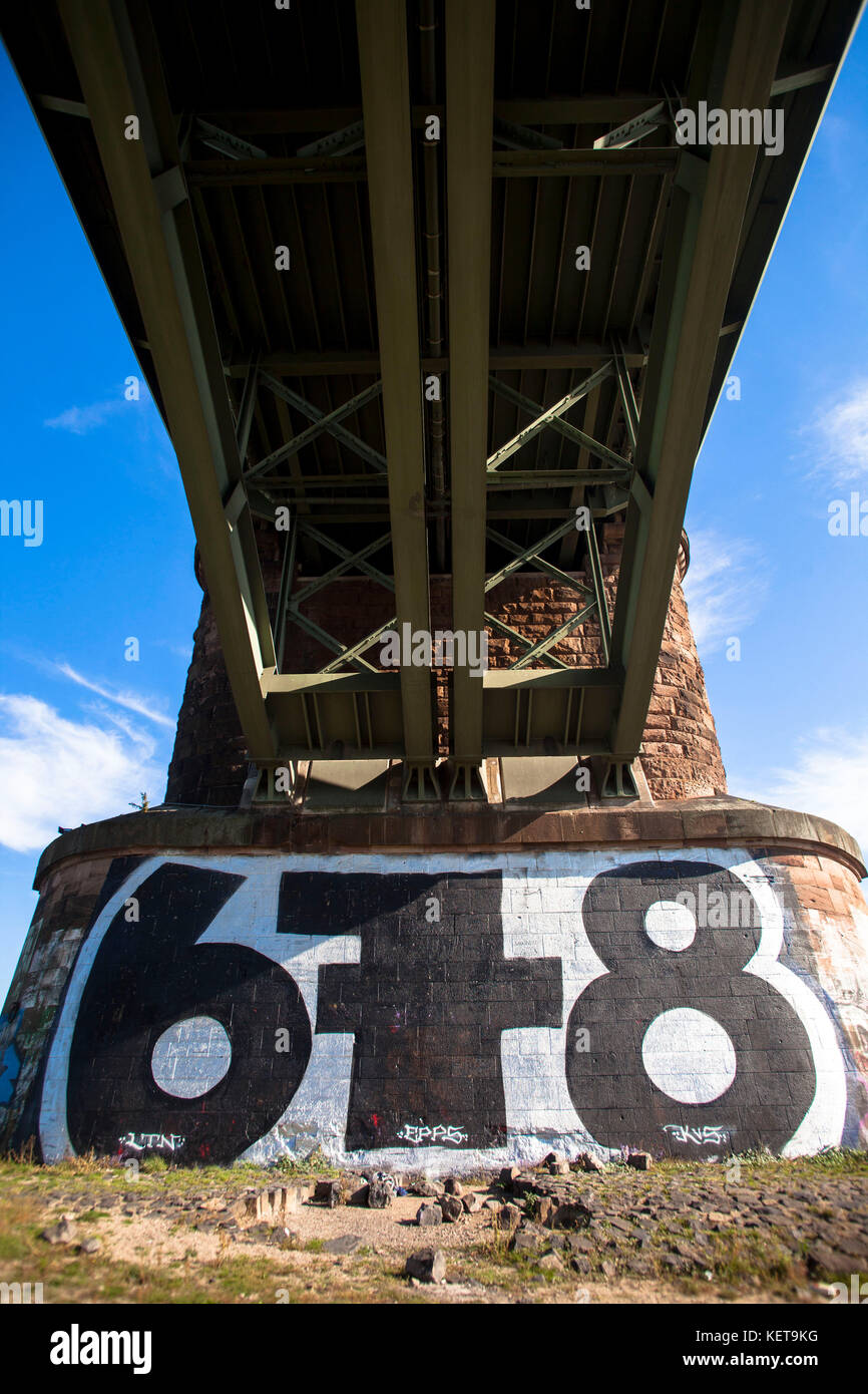 Germany, Cologne, graffiti on a pillar of the Suedbruecke in the ...