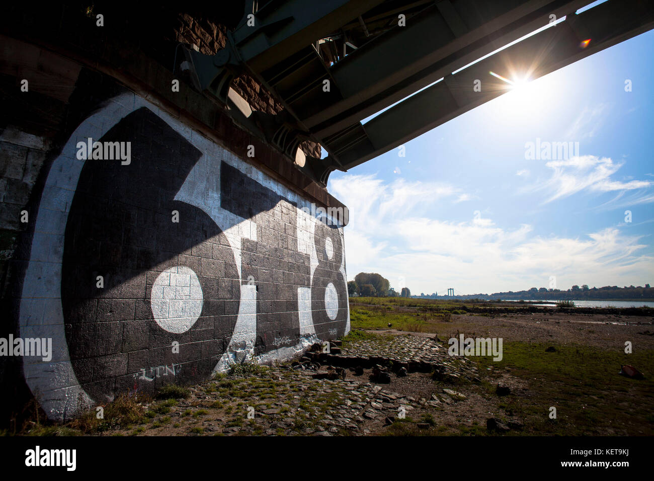 Germany, Cologne, graffiti on a pillar of the Suedbruecke in the ...