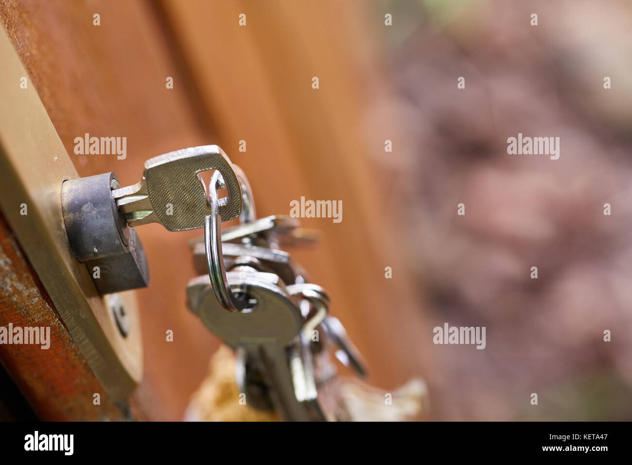 Open garden gate with key Stock Photo - Alamy