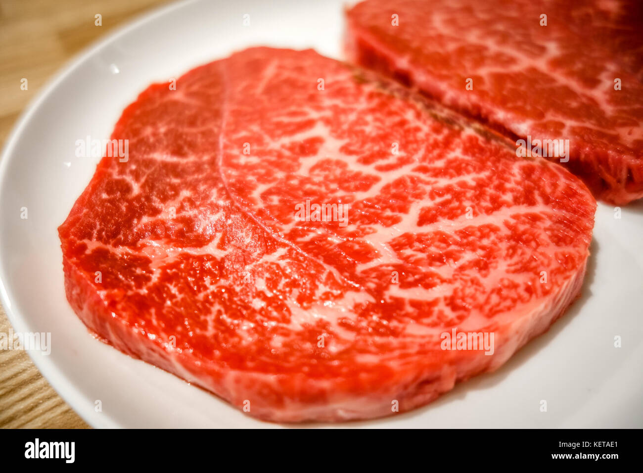 Raw Kobe wagyu beef steaks in a plate Stock Photo - Alamy