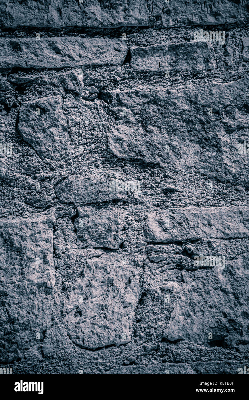 Photograph of a stone wall texture or background Stock Photo - Alamy