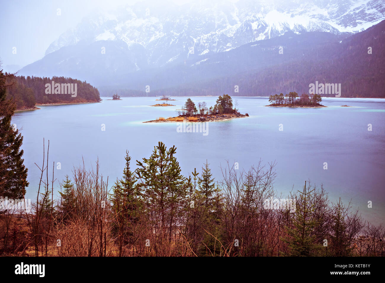 The Lake Eibsee in Alps at rain weather in spring, Garmisch ...