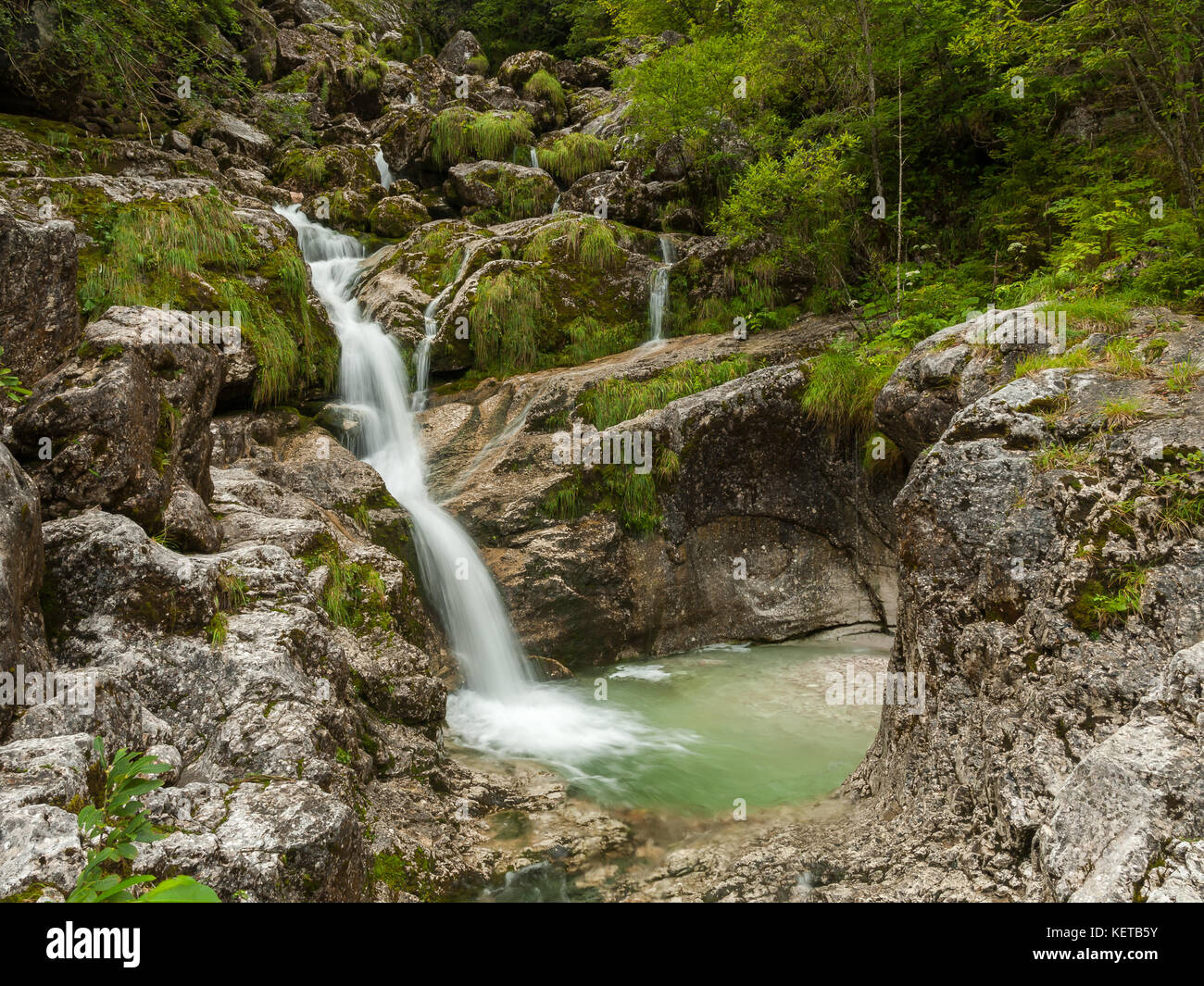 View of a small waterfall near Hallstatt in the Austrian alps Stock ...