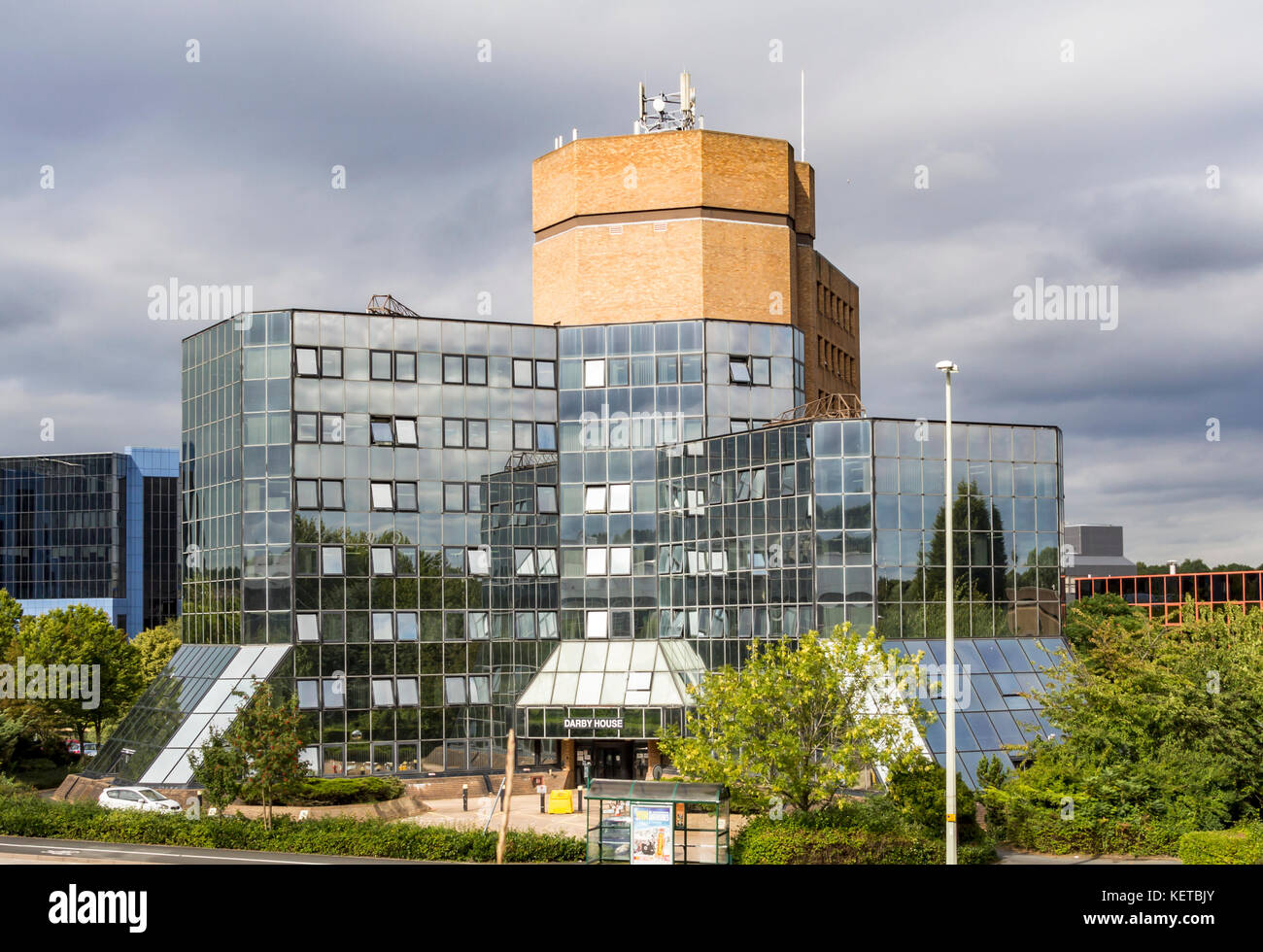 Office block tower skyscraper building architecture urban trees blue ...
