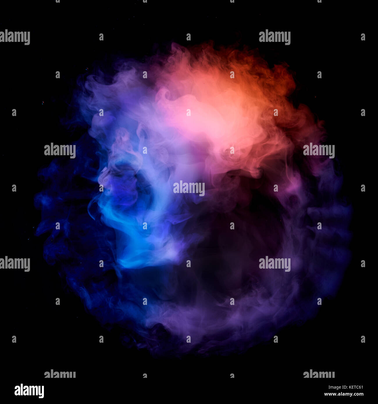 colored smoke on a black background Stock Photo - Alamy