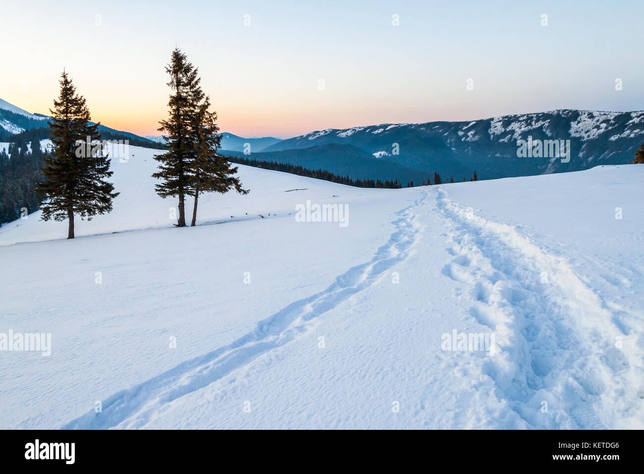 Beautiful winter landscape in the mountains with snow path in steppe ...